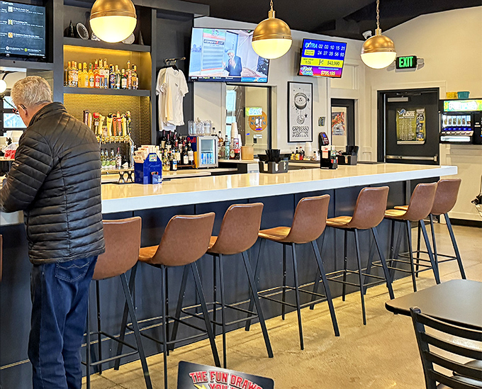 The counter offers front-row seats to the culinary action, where regulars exchange news while waiting for their comfort food fix.