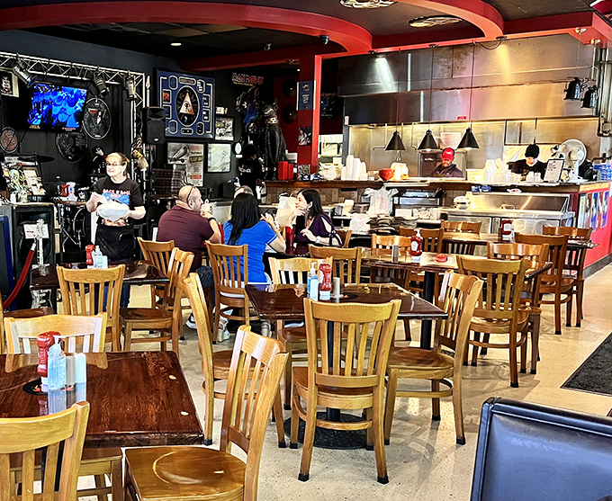 The dining room buzzes with the energy of fans at a concert, united by their appreciation for great food and classic rock.