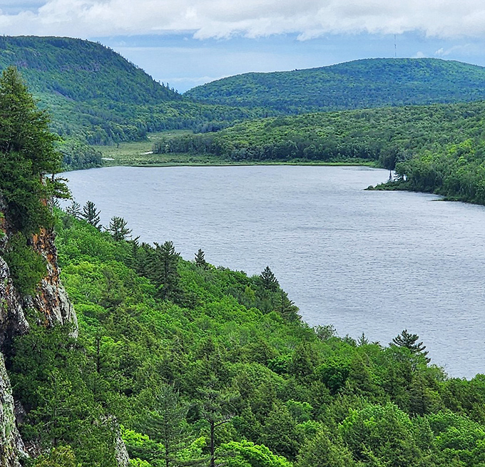 The lake's mirror-like surface perfectly doubles the scenery, as if nature decided one helping of beauty simply wasn't enough.