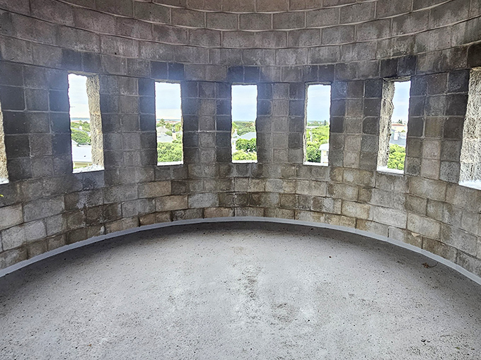 Light streams through these simple openings, creating dramatic shadows that dance across stone walls throughout the day.