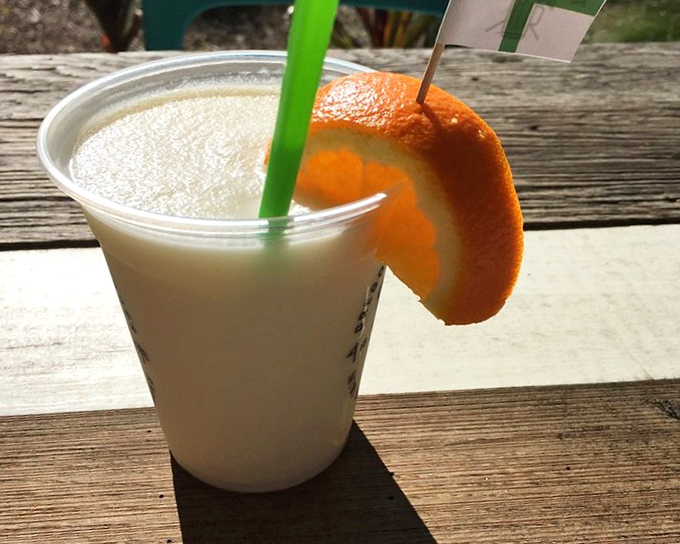 A frosty pi&ntilde;a colada garnished with orange creates the perfect tropical moment&mdash;just sweet enough to soften the blow of that double bogey.