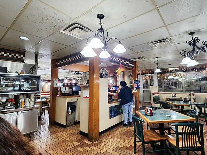 Behind the counter, Tony's staff orchestrates the magic &ndash; efficiency experts who navigate the bustling dining room with plates that qualify as weight training.