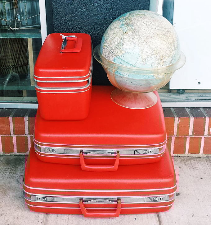 Vintage luggage stacked like a time traveler's dream &ndash; these red Samsonite beauties have stories to tell from journeys long past.