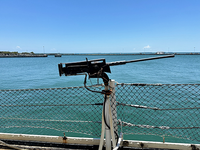 This isn't your weekend fishing gear! The ship's impressive harpoon gun stands ready against the backdrop of Key West's crystal waters.