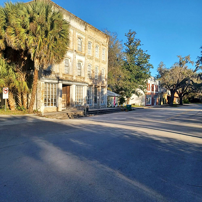 This stretch of 3rd Street showcases Micanopy's architectural heritage, where weathered buildings house modern businesses with vintage souls.