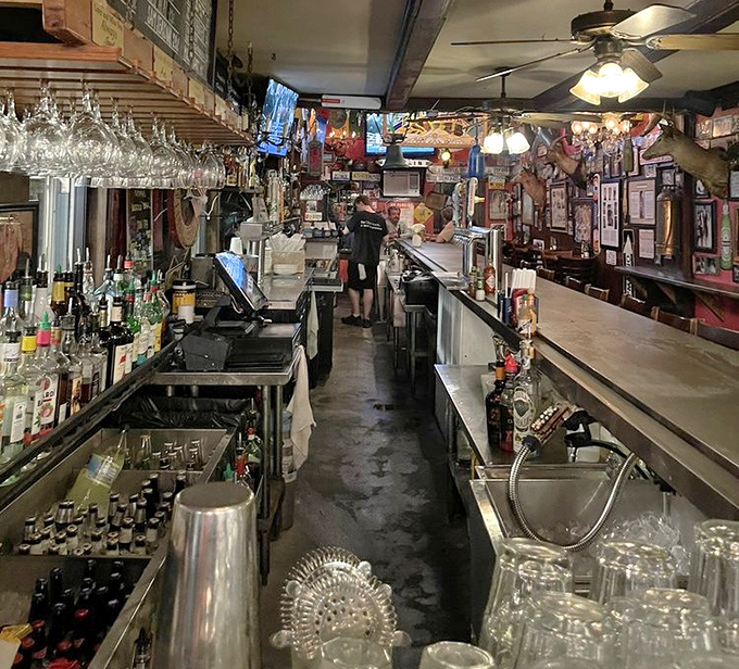 Where sea stories flow as freely as the spirits, this narrow passage of libations has witnessed countless toasts to great meals and greater company.