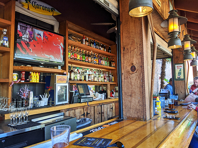 The bar showcases an impressive selection of spirits, ready to be transformed into signature cocktails that capture Florida's playful spirit.