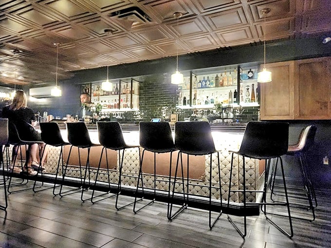 The bar itself is a masterpiece of design &ndash; elegant lighting, comfortable seating, and a backdrop that whispers "stay awhile" to literary-minded imbibers.