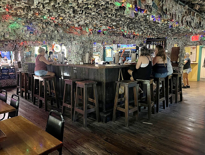 Bar Seating Area: Where stories flow as freely as the drinks, surrounded by thousands of George Washingtons who've heard it all before.