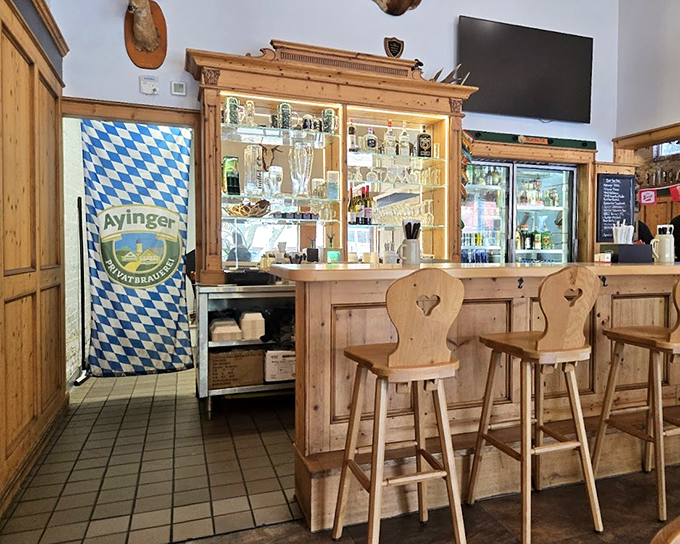 The bar area combines old-world charm with new-world hospitality – note the Ayinger banner, a sign you're in good beer hands.