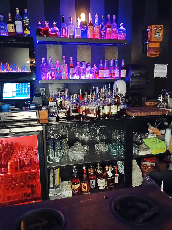 Bottles illuminated like precious artifacts in this museum of libation, where every label tells a story of craftsmanship.