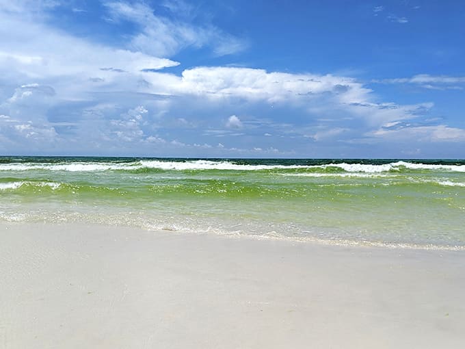 The beach where the water comes in fifty shades of blue and the sand is whiter than a Hollywood smile.