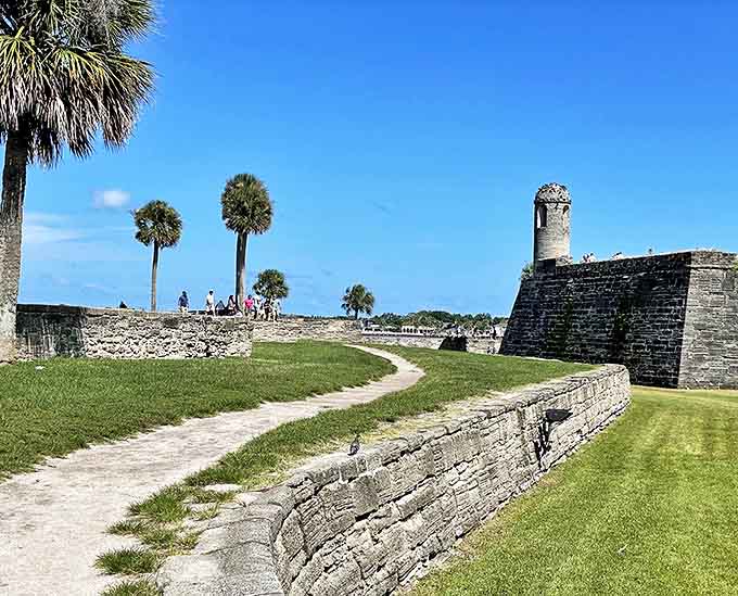 Sun-drenched pathways wind through the fort grounds, inviting exploration of every nook where history whispers its secrets.