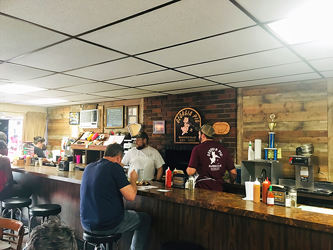 The heart of Georgia Pig &ndash; where orders are called, stories are shared, and barbecue traditions are preserved one plate at a time.
