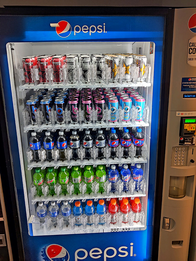 The well-stocked Pepsi cooler stands ready to rehydrate gamers after intense sessions of button-mashing and joystick-jiggling adventures.
