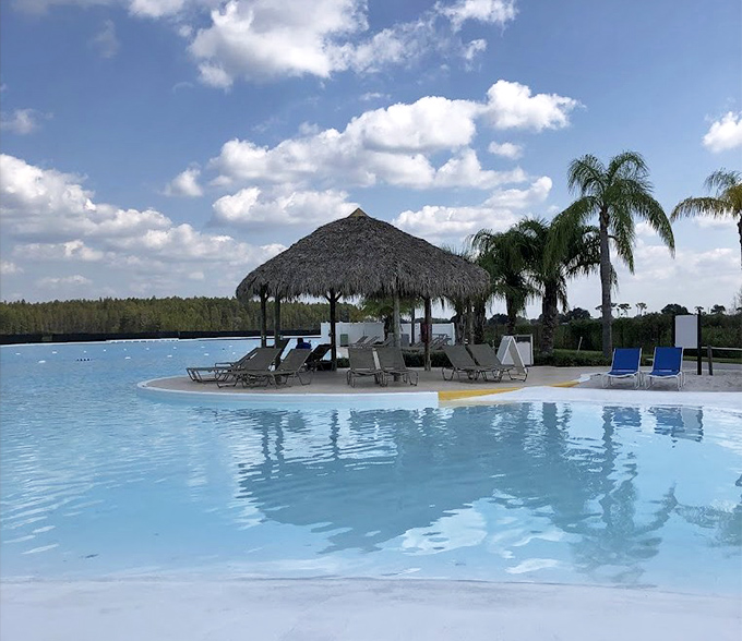Island Lounge Chair Area Palm trees and thatched huts create the perfect tropical backdrop for your "guess where I am" social media posts.