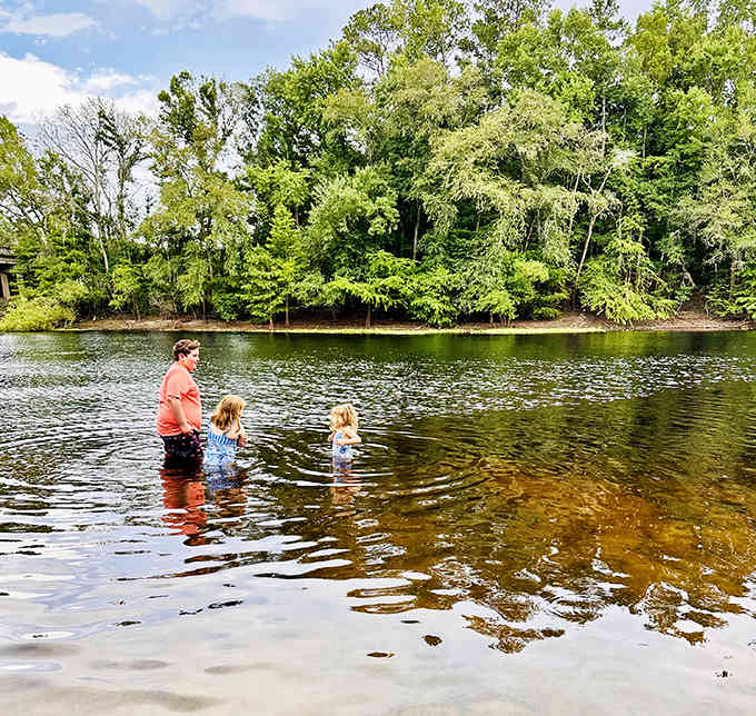 Family bonding happens naturally in these tea-colored waters, where splashing and laughter replace the pings of notifications and digital distractions.