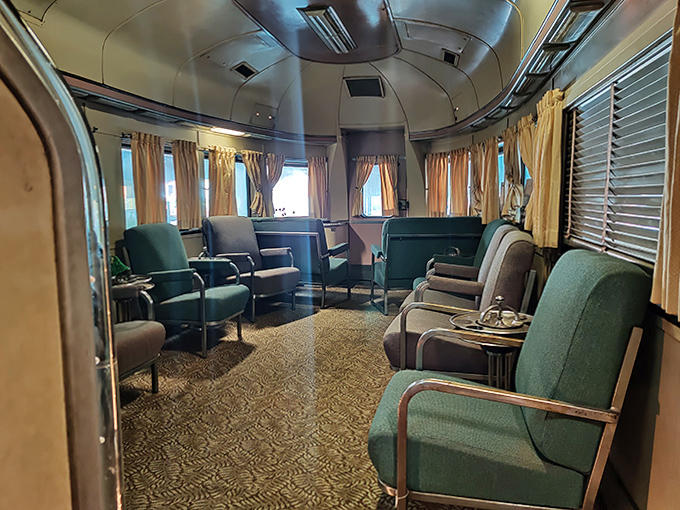 These observation lounge chairs have hosted countless conversations, card games, and quiet moments of watching America unfold outside the windows.