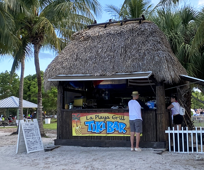La Playa Grill's tiki bar serves up refreshments with a side of "why don't we do this more often?" vacation vibes.