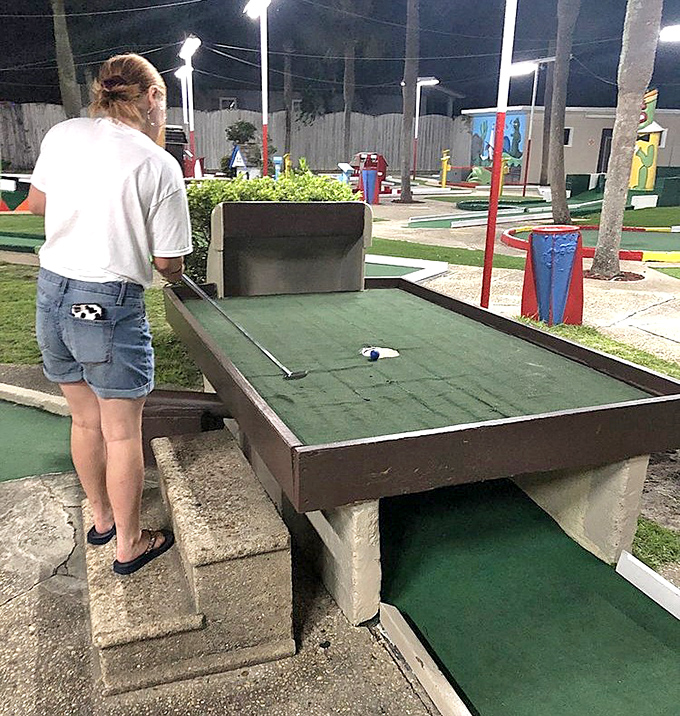 The raised putting platform offers both a challenging angle and a commanding view of this kingdom of concrete creatures.