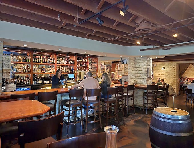 Warm wood tones and an impressive spirits collection transform institutional space into an inviting watering hole – where visitors toast to the building's remarkable second act.