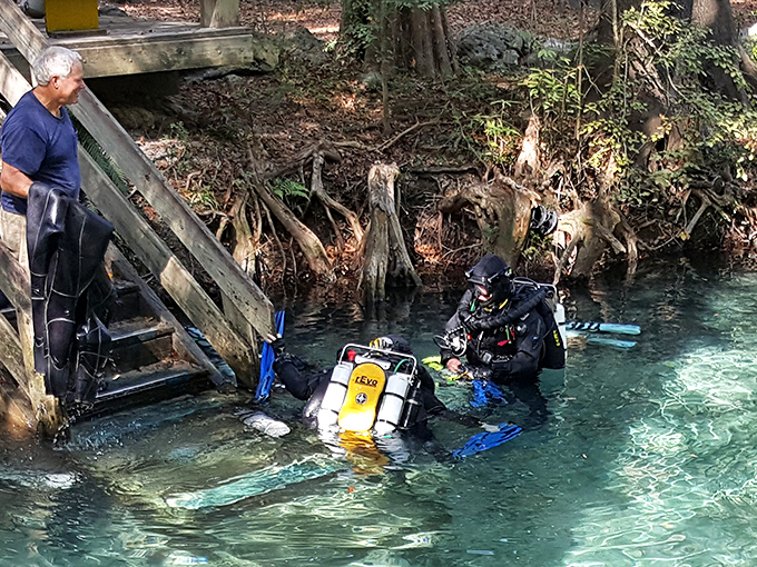 Serious adventure awaits beneath the surface &ndash; scuba divers prepare to explore the underwater cave system that draws enthusiasts from around the world.