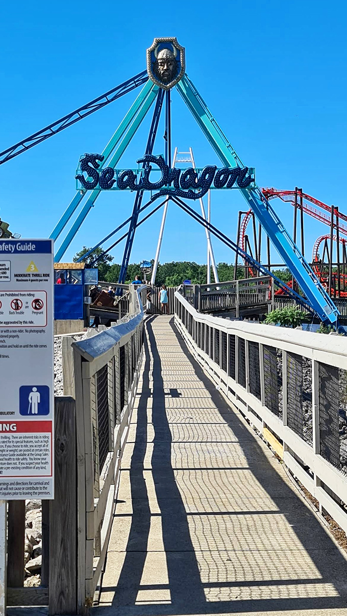 The Sea Dragon swings riders through the air like a pendulum of joy, each arc higher than the last until stomachs and gravity have serious disagreements.