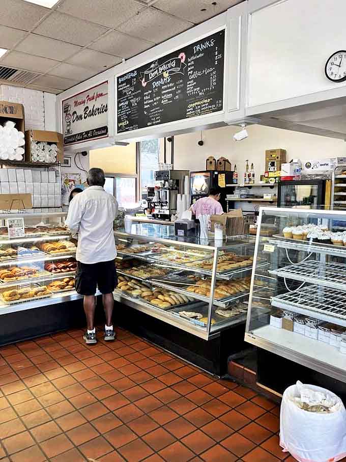 At this service counter, they're not just selling donuts – they're distributing happiness in paper bags.