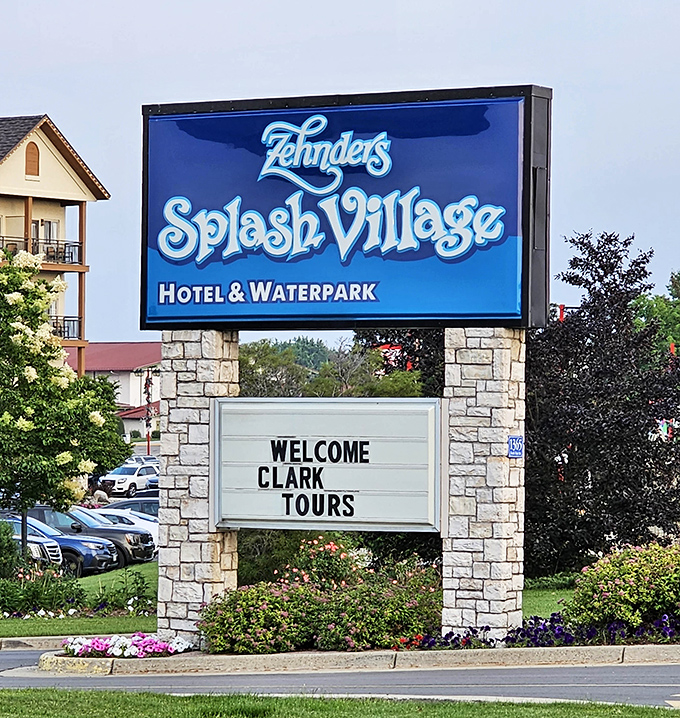 The welcoming sign stands as a beacon of hope during Michigan winters, promising tropical temperatures just steps away.