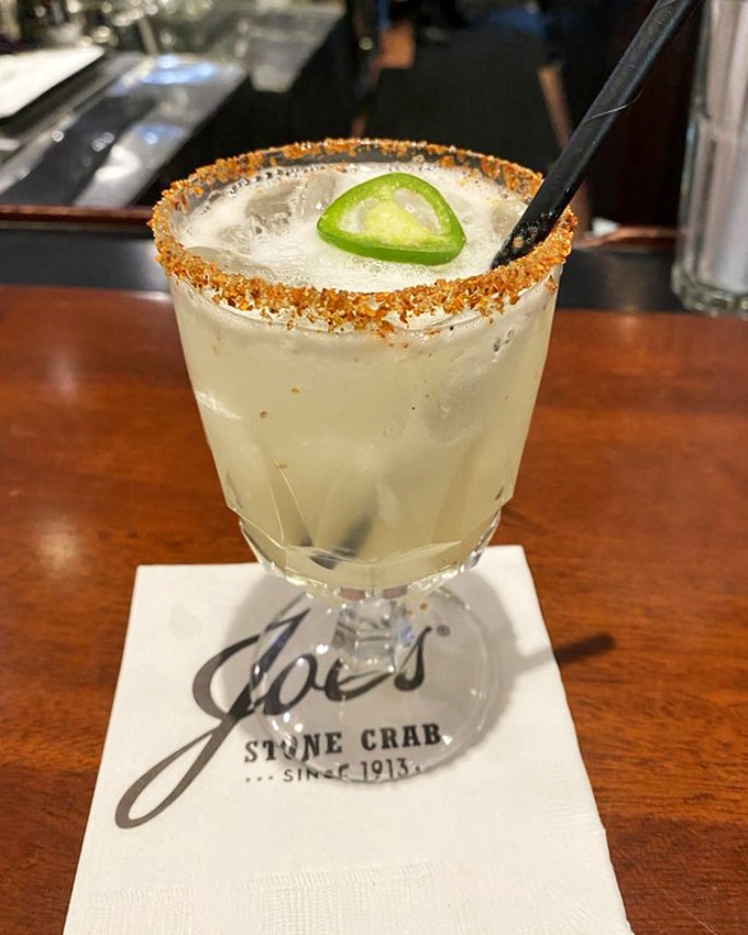 The spicy pineapple margarita with its chili-salt rim delivers the perfect balance of sweet tropical fruit, tangy lime, and just enough heat to keep things interesting.