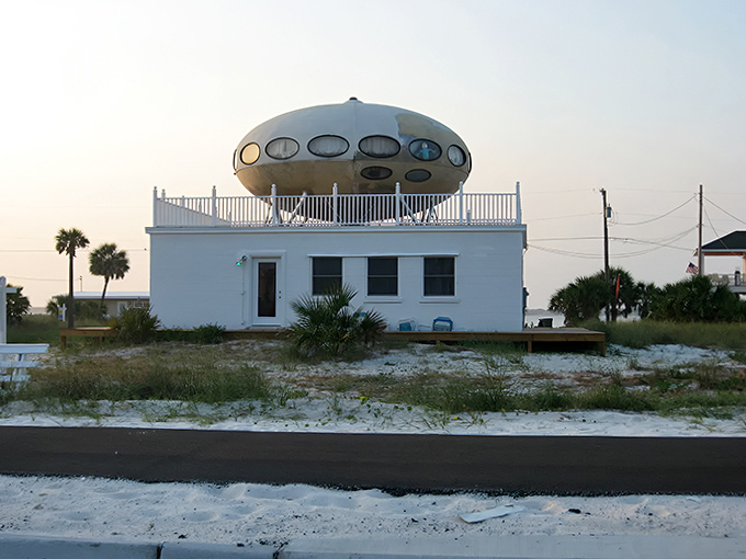 Sunset casts a golden glow on this architectural oddity, transforming it from quirky roadside attraction to magical twilight vision.