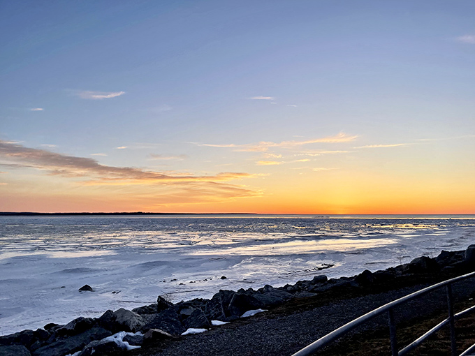 Nature's light show: Sunset transforms the waters of the Straits of Mackinac into a canvas of gold, amber, and deepening blue.