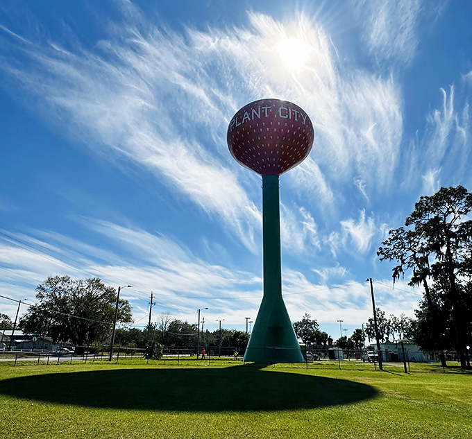 Morning light bathes the strawberry tower in a golden glow, making this already sweet landmark look positively caramelized against the sky.