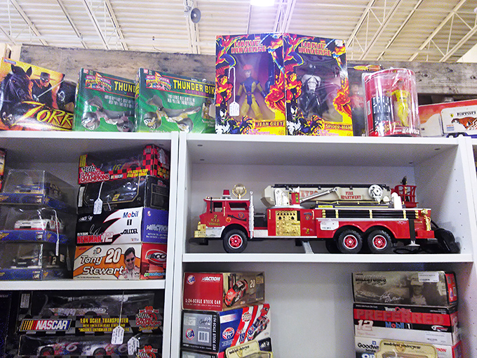Childhood memories line these shelves, where vintage toys wait patiently for collectors who recognize their faces from Christmas mornings past.