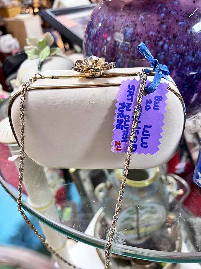 This elegant clutch once held lipstick, cigarettes, and secrets—now it waits for a new night on the town.