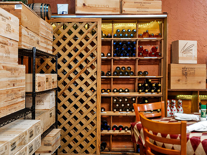 Wooden wine racks showcase an impressive collection that spans Italian regions and beyond, promising the perfect pairing.