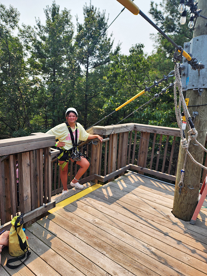 The wooden platform serves as both launching pad and courage-gathering space – that moment before takeoff when everything changes.