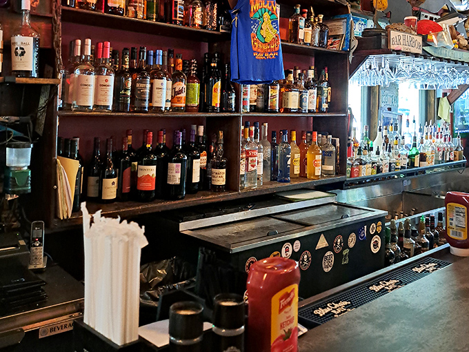 The bar doesn't just serve drinks &ndash; it serves as a museum of island life, where bottles stand at attention ready to transform ordinary moments into vacation memories.