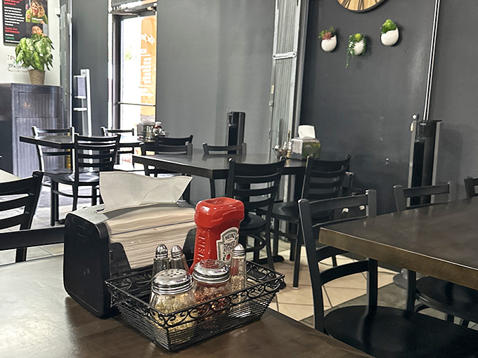 The supporting cast to your pizza experience &ndash; red pepper flakes, parmesan, and napkins you'll definitely need for those cheese pulls.