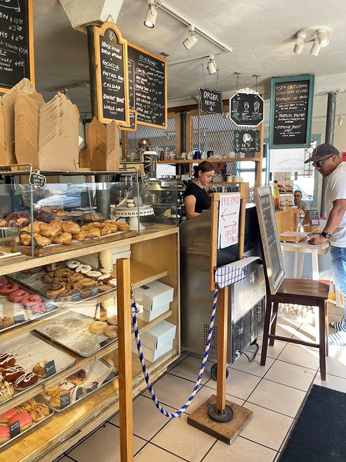Where breakfast dreams begin &ndash; glass cases showcasing the day's freshly baked treasures while chalkboard menus promise more delights.
