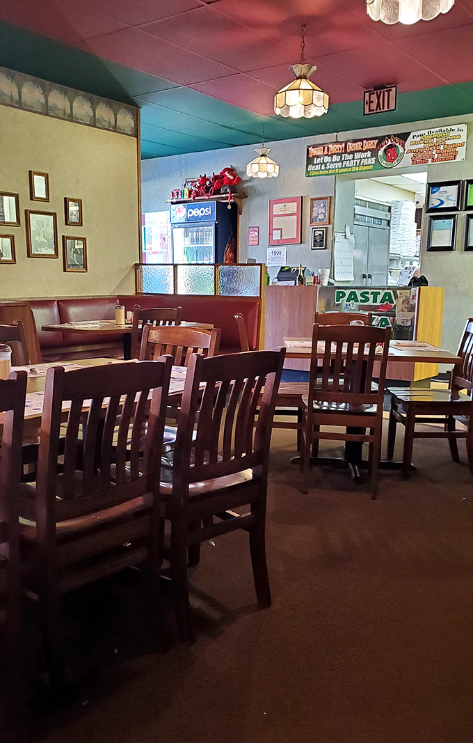 Wooden chairs and tables create an unpretentious dining space where the food, not the decor, rightfully remains the star attraction.