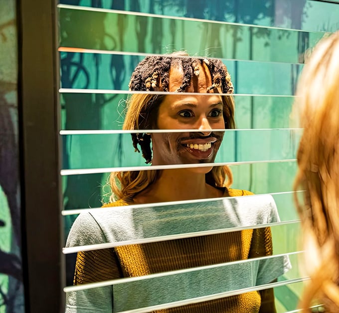 This clever mirror installation slices and rearranges faces into surreal new combinations. Picasso would approve of this cubist approach to selfies.