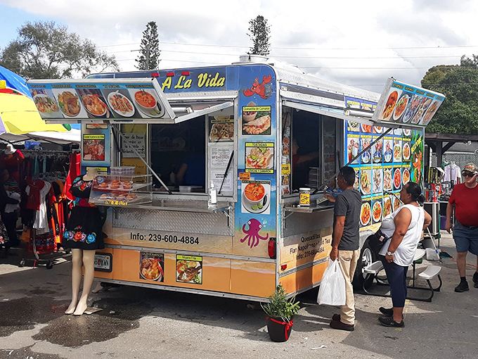A La Vida food truck brings the fiesta to hungry shoppers. Those seafood tacos might just be the real treasure of the day.