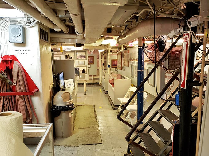 History lines both sides of this narrow passageway, where educational displays tell the story of the vessel's remarkable service.