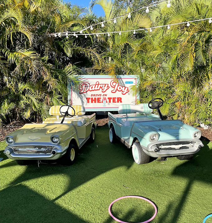 The miniature drive-in theater setup isn't just Instagram bait—it's a time portal to when dates meant sharing a shake and stealing glances over chrome tables.