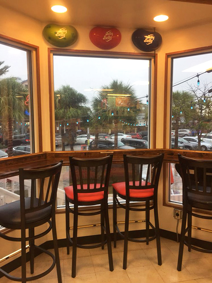 Window seats offer prime people-watching real estate while you contemplate the deeper meaning of your butter pecan scoop.