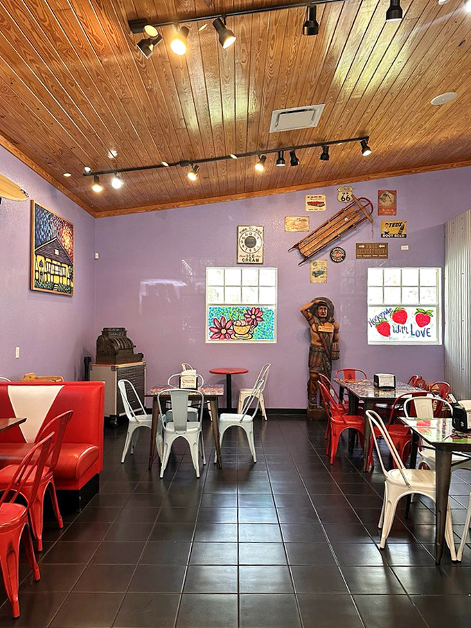 Purple walls, wooden ceilings, and eclectic d&eacute;cor create a dining space that feels like eating dessert in your coolest friend's living room.