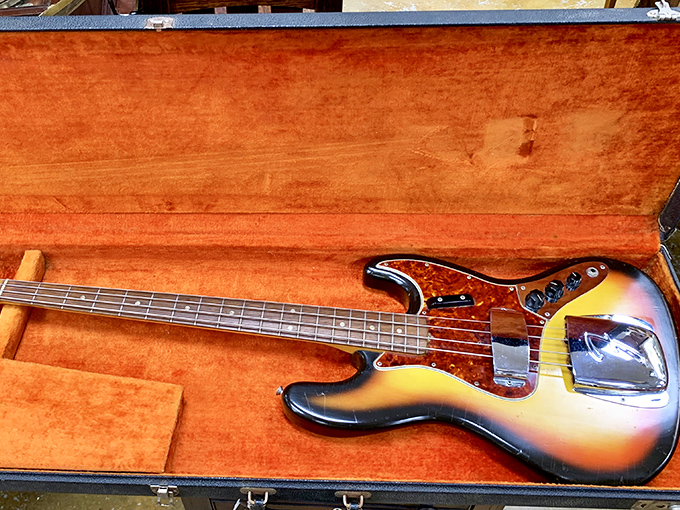 This sunburst Fender Jazz Bass silently waits for fingers to once again coax music from its strings and stories from its past.