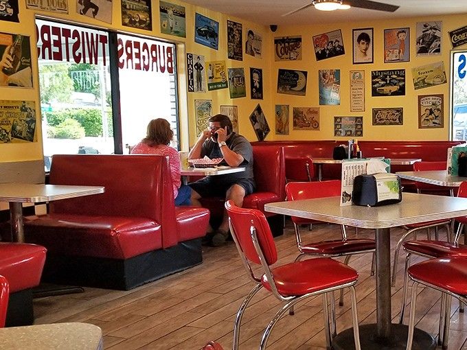 Red vinyl booths and vintage posters create the perfect backdrop for making memories, one banana split at a time with friends and family.