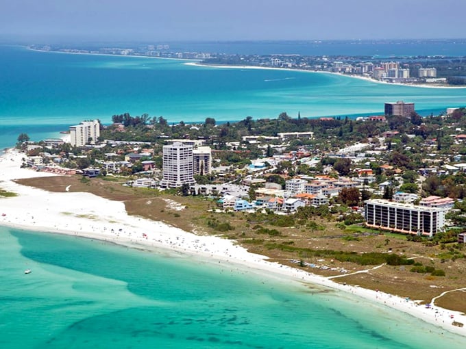 Siesta Key's famous white sand beach glows against the turquoise Gulf waters, creating a scene worthy of any travel magazine.